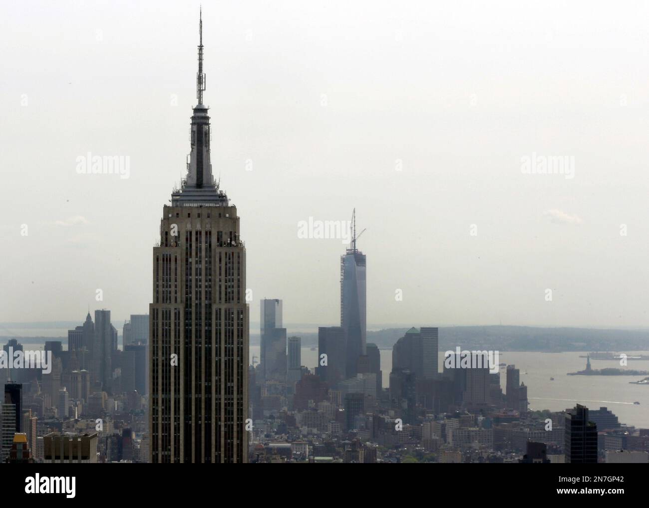 The 1,454-foot Empire State Building, left, the 1,776-foot One World ...