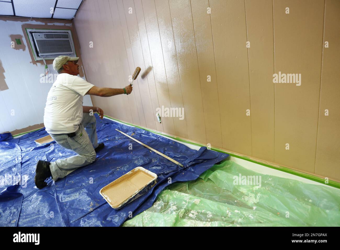 Sears volunteers paint the VFW hall as the company kicks off its sixth ...