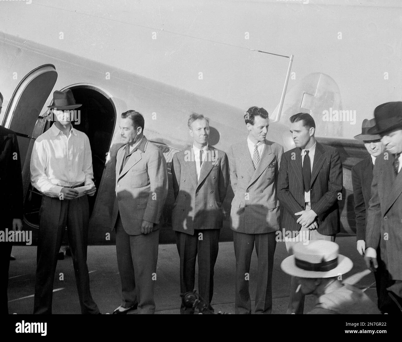 Millionaire sportsman Howard Hughes and his crew lined up at Floyd ...