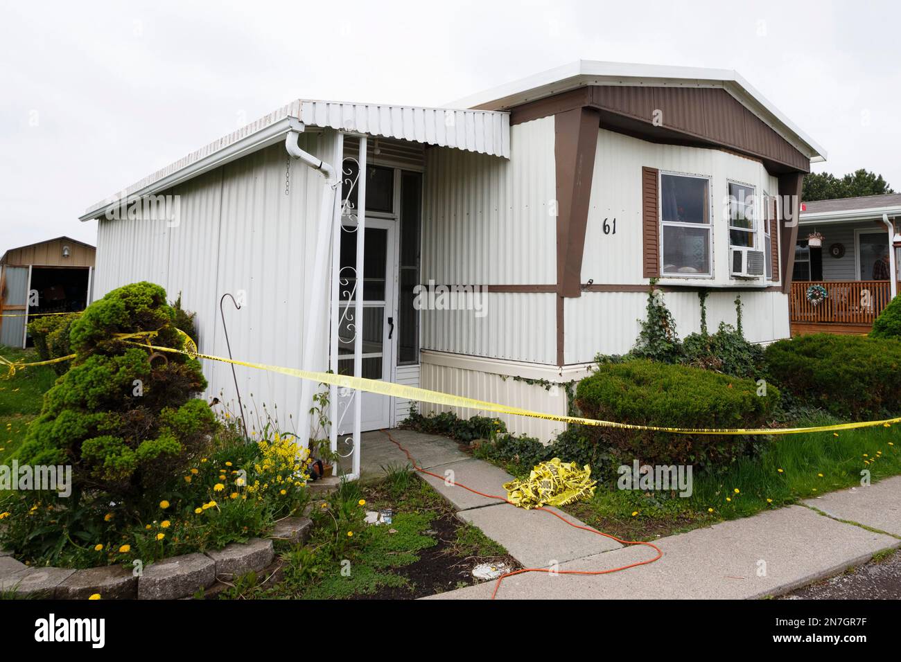 Police tape closes off the home of Blake and Blaine Romes in Ottawa ...