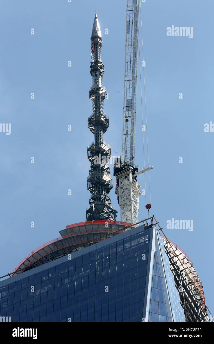 The 408-foot spire at the top of One World Trade Center is seen from ...