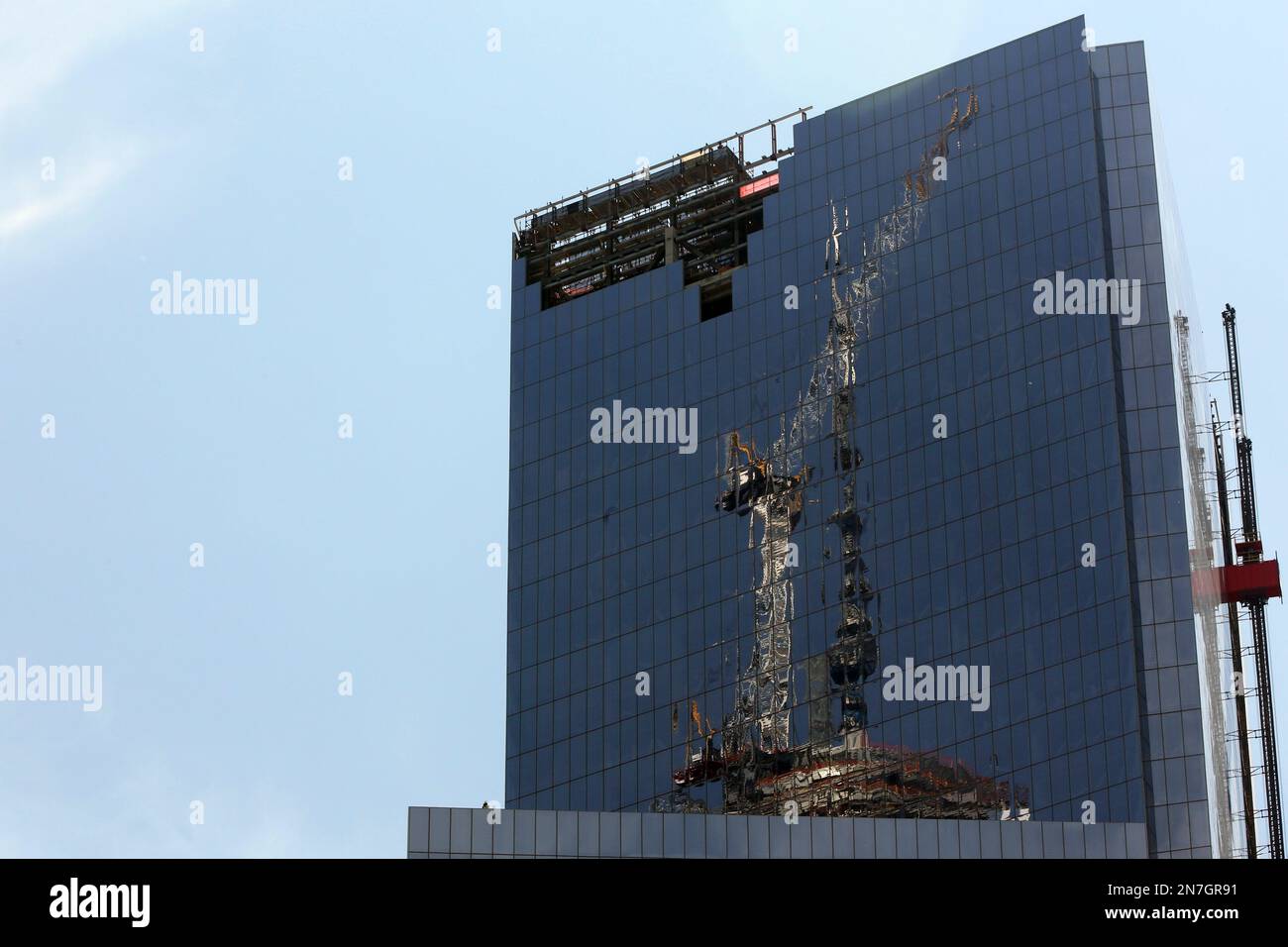 The 408-foot spire at the top of One World Trade Center is seen ...