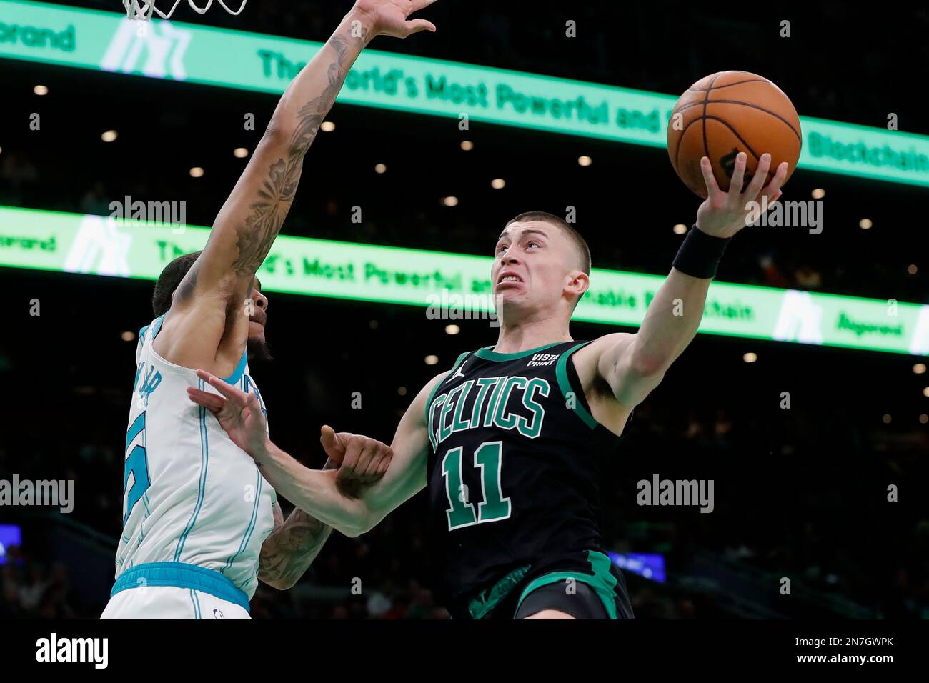 Boston Celtics' Payton Pritchard (11) shoots against Charlotte Hornets ...