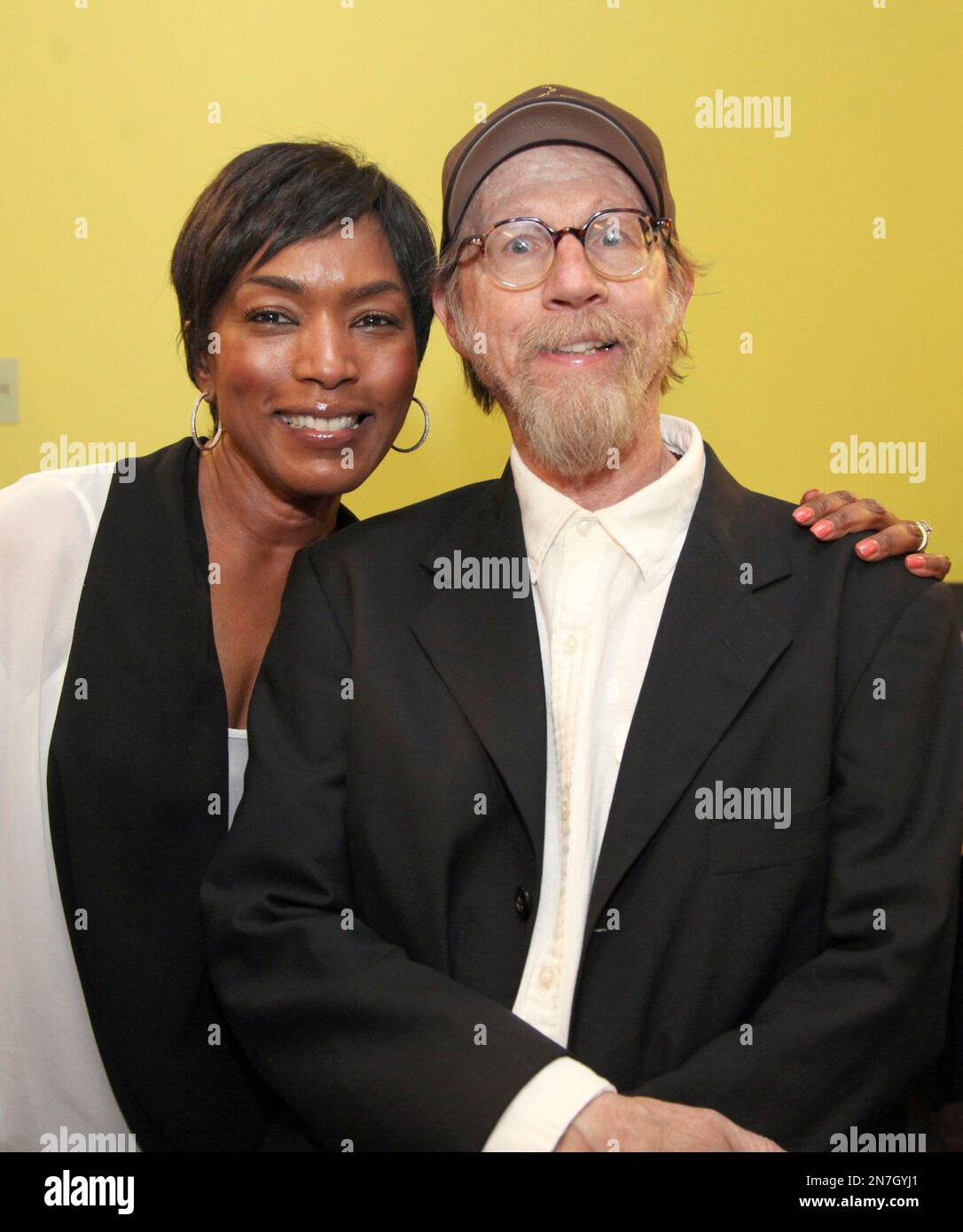 From left, actress Angela Bassett and cast member Raynor Scheine pose ...