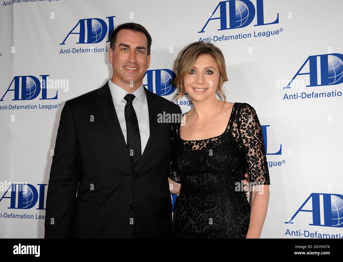 Actor Rob Riggle. left, and actress Sarah Chalke attend the Anti ...