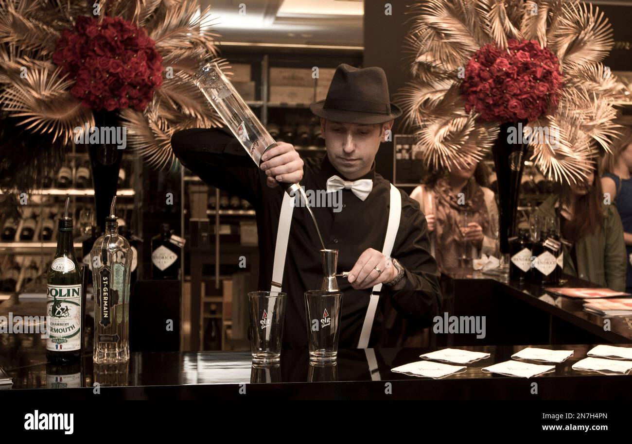 A general view of a cocktail waiter mixing drinks during the press ...