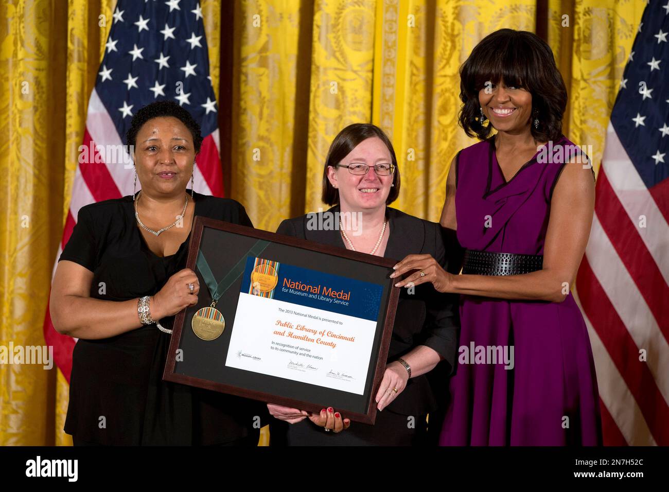 Amina Tuki , left, and Kimber Fender, of the Public Library of ...
