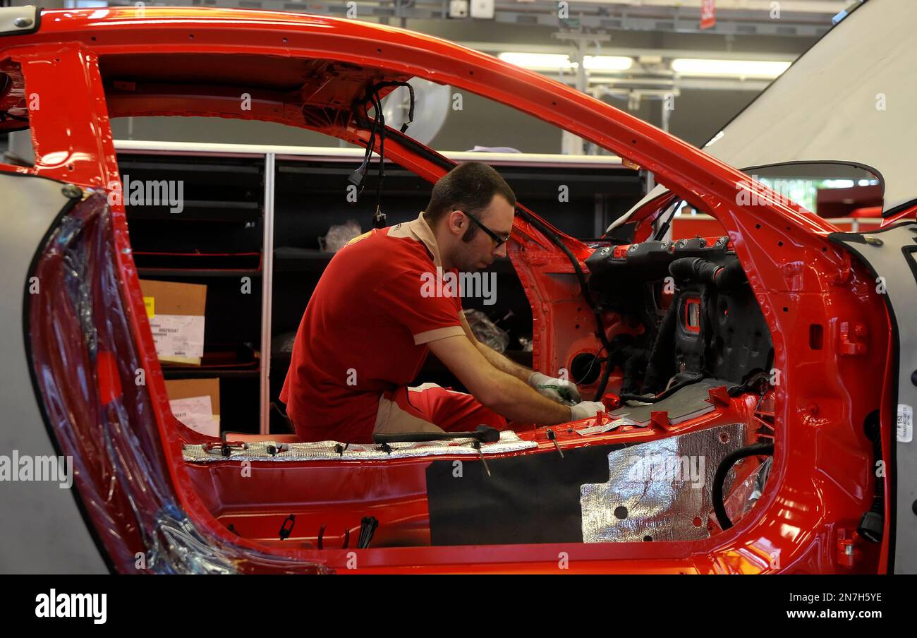 A technician works at the Ferrari department factory in Maranello ...