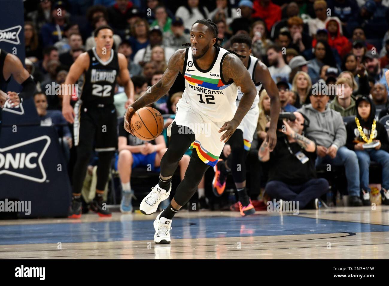 Minnesota Timberwolves forward Taurean Prince (12) brings the ball up ...