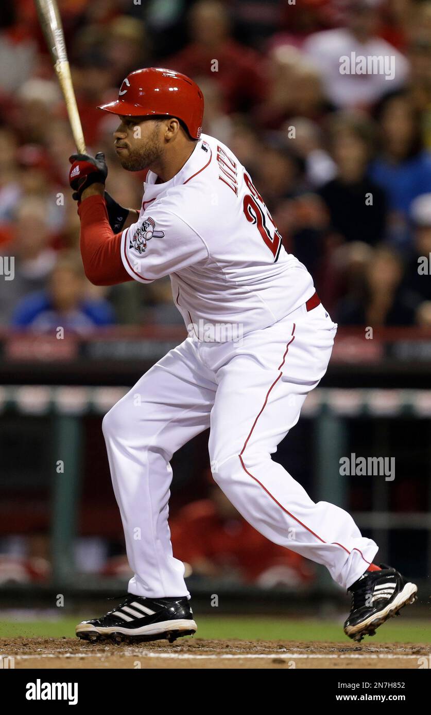 Cincinnati Reds' Donald Lutz hits an RBI single off Atlanta Braves ...