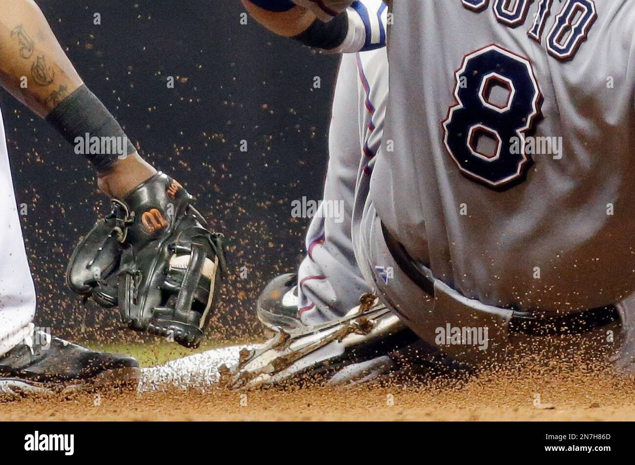 Texas Rangers' Geovany Soto slides safely into second for a double ...