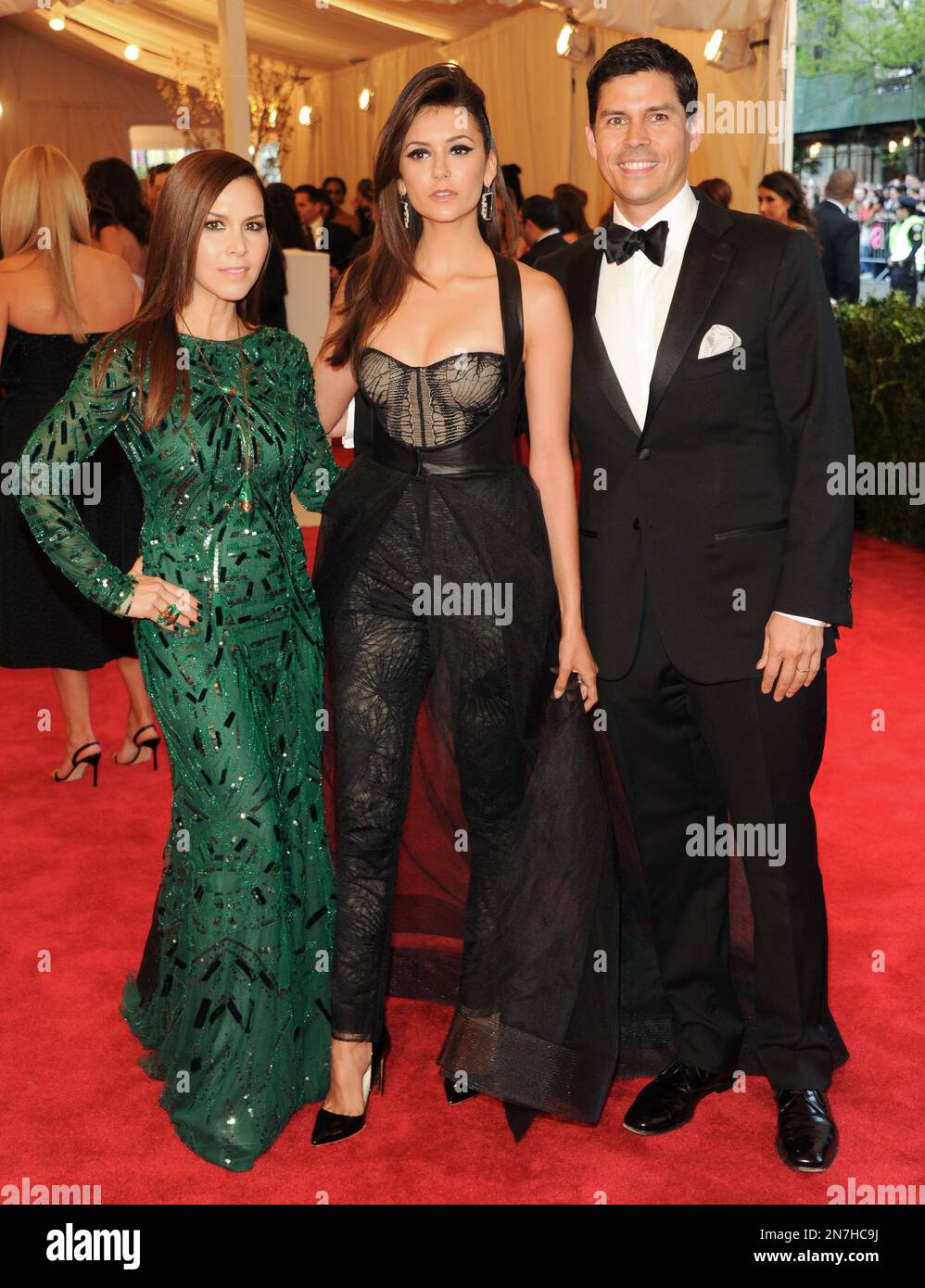 Monique Lhuiller, left, Nina Dobrev and Tom Bugbee attend The ...