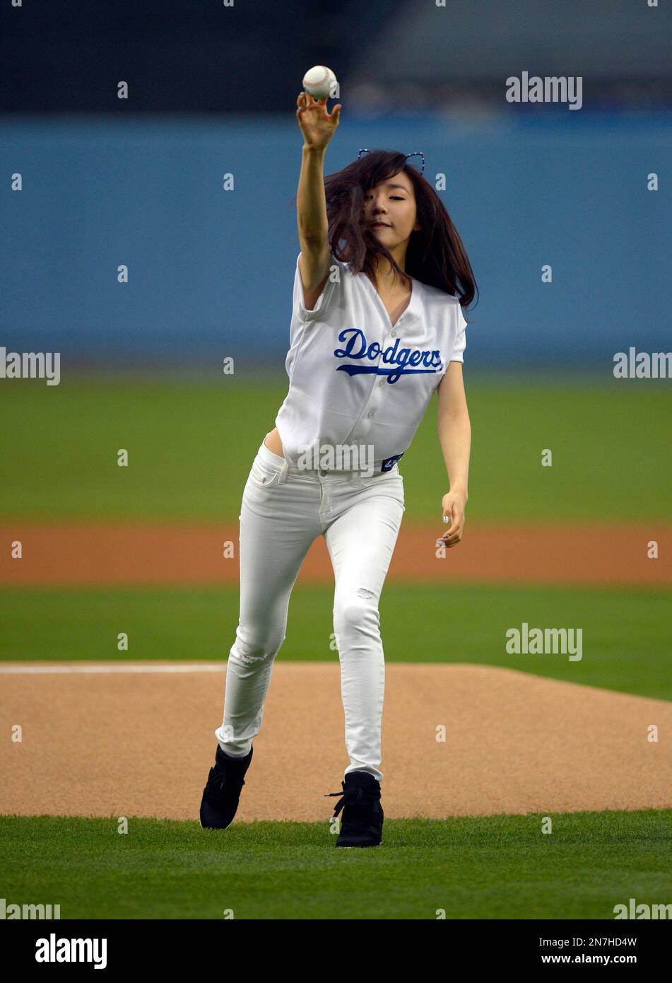 American born Korean pop singer Tiffany Hwang throws out the ceremonial ...