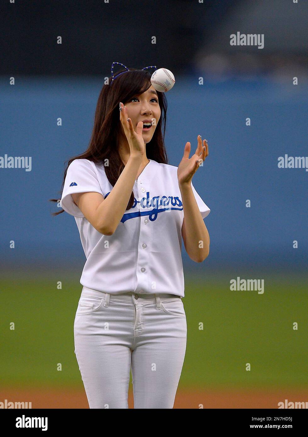 American born Korean pop singe Tiffany Hwang gets set to throw out the ...