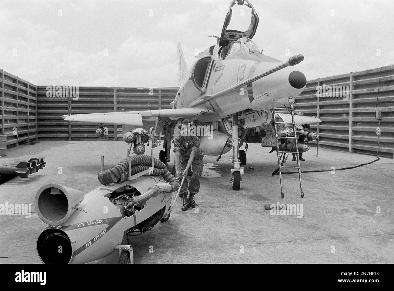 A Navy bomber moves into parking position on the deck of the USS ...