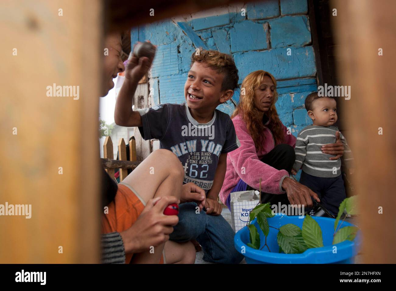 Amir Hasanovic cracks a boiled egg onto to head of his brother Haris ...