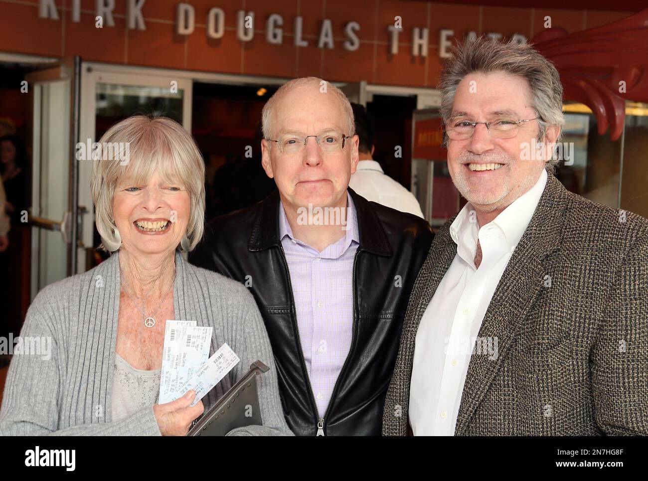 Center, CTG Producing Director Douglas C. Baker poses with CTG donors ...