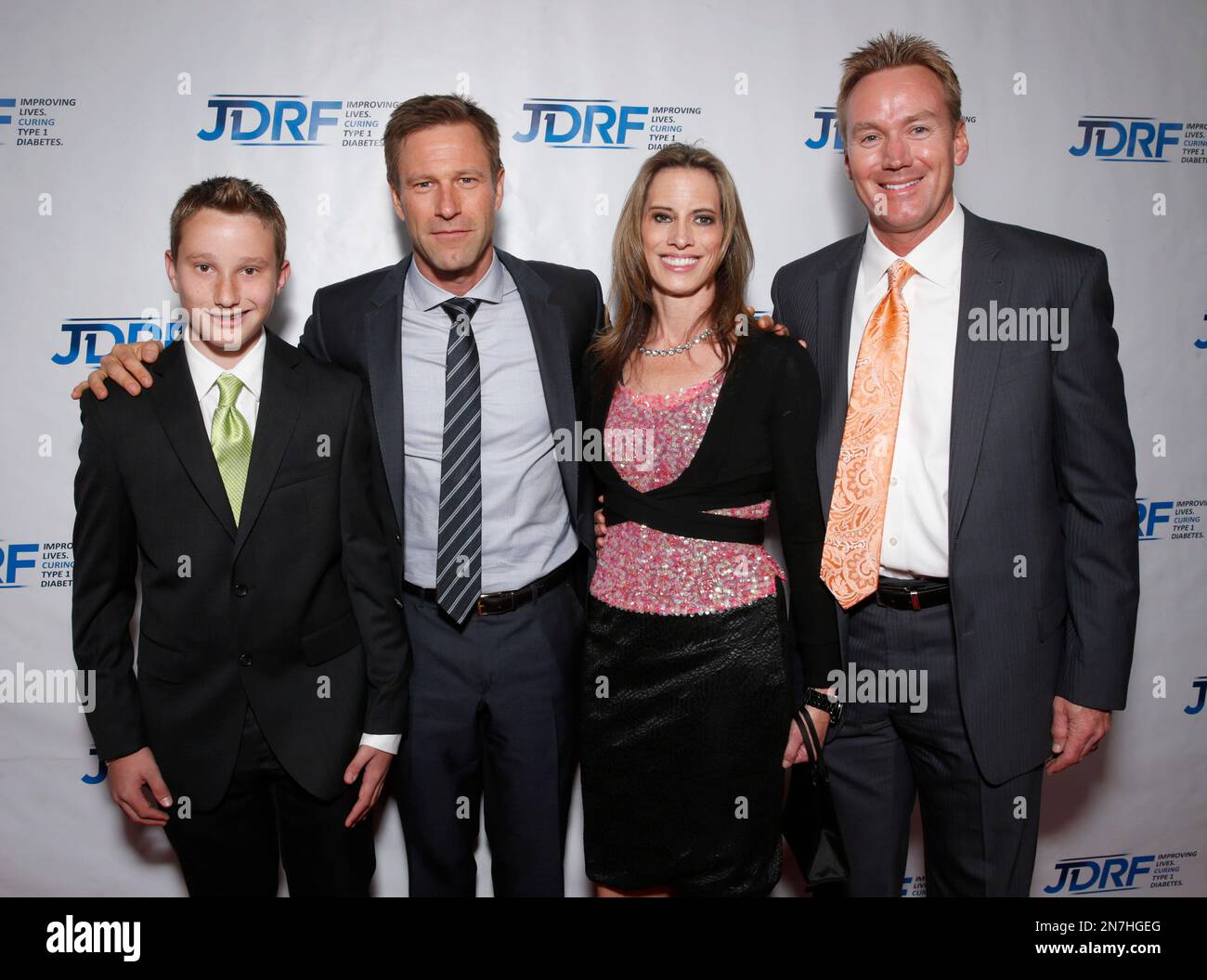 Braxton Johnson and parents with Aaron Eckhart attend the JDRF LA's ...