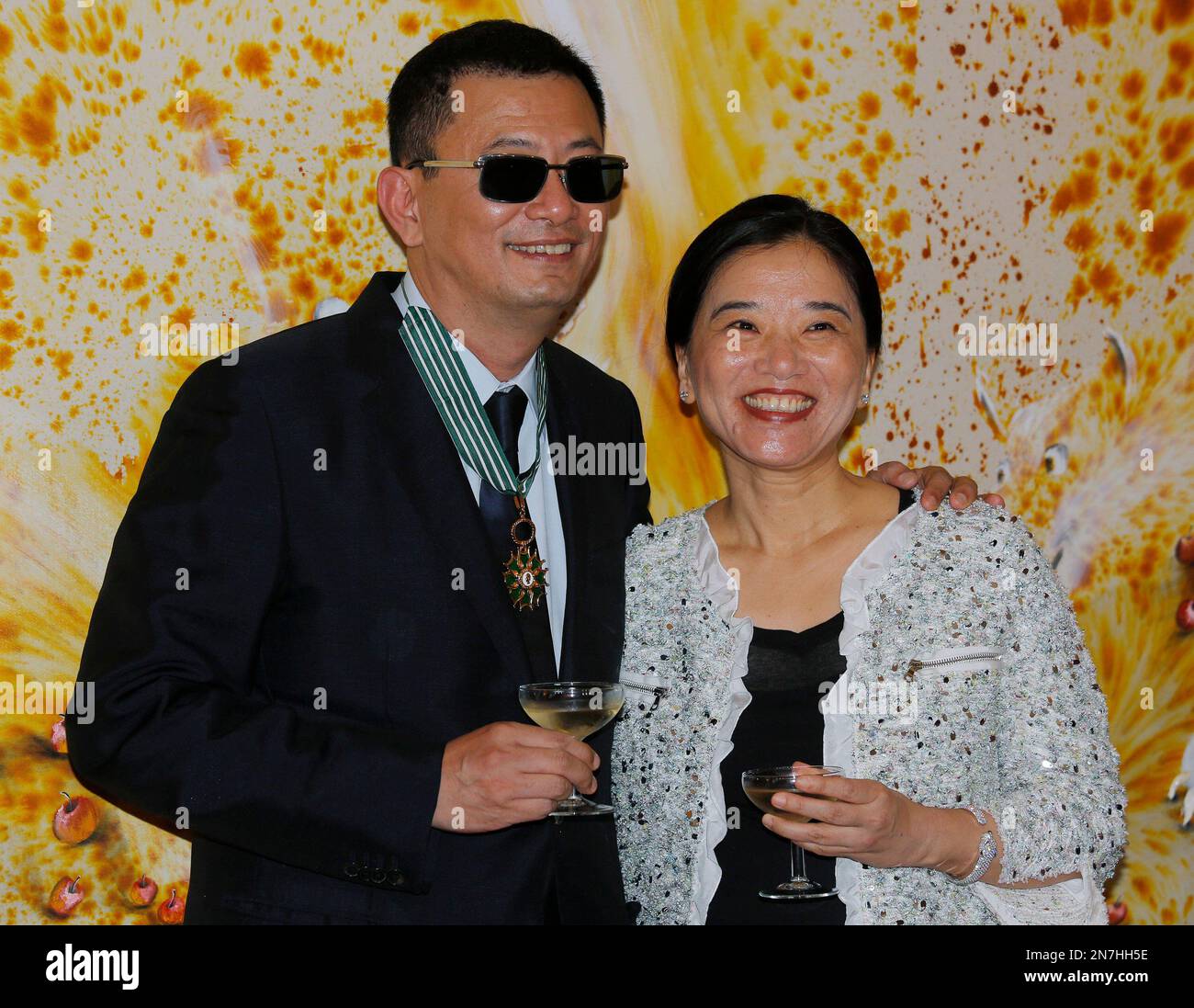 Hong Kong director Wong Kar-wai, left, and his wife Esther smile after ...