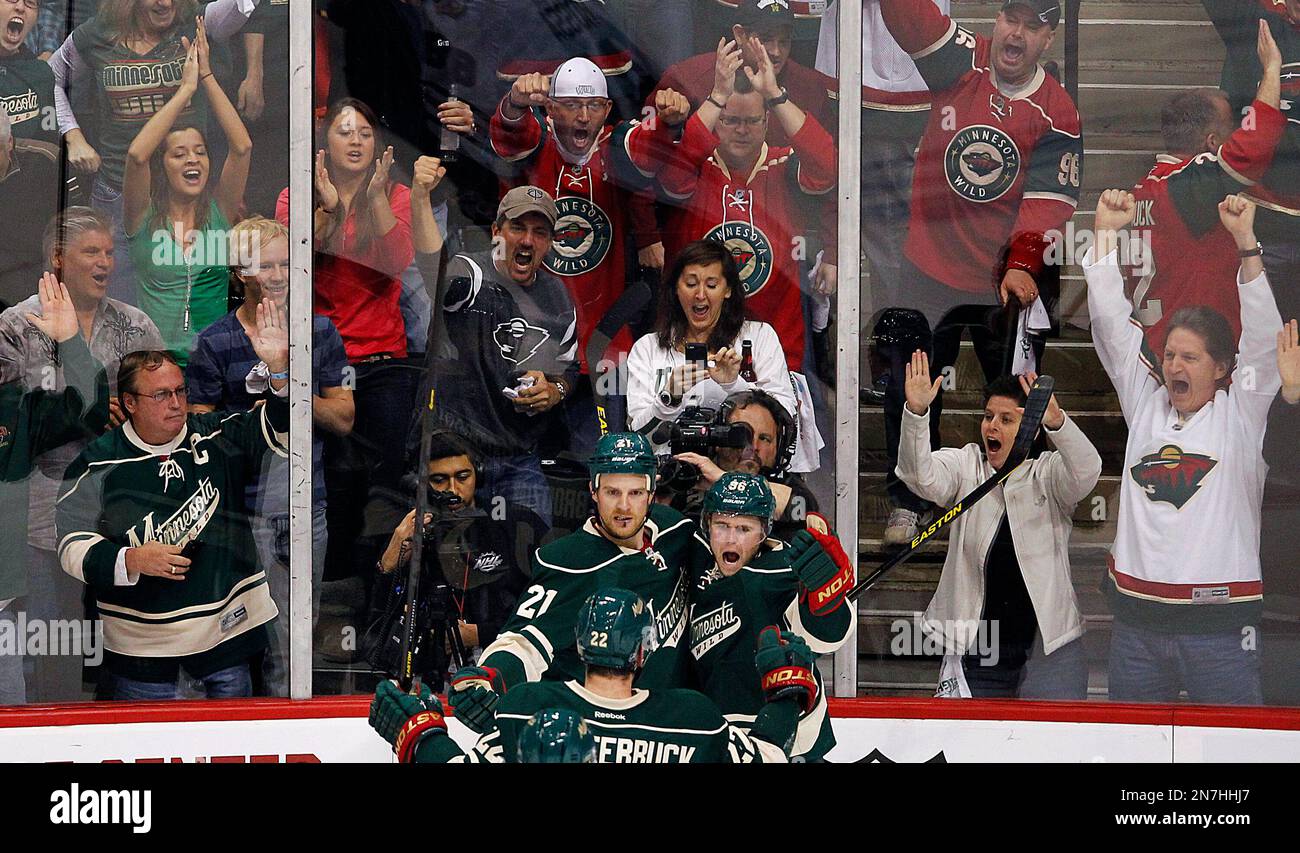Minnesota Wild's Pierre-Marc Bouchard (96) and Kyle Brodziak (21 ...
