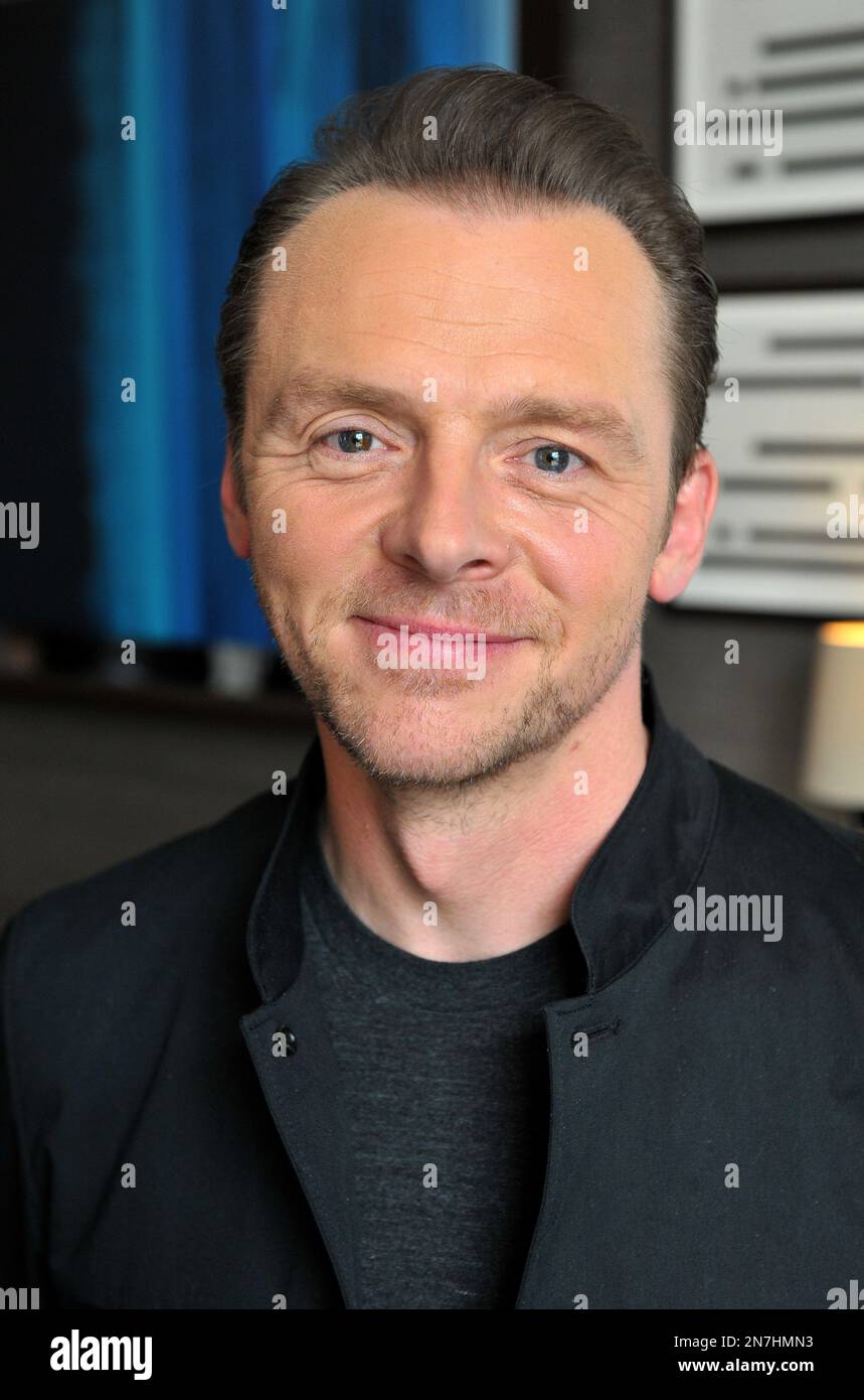 Simon Pegg poses for a portrait session at the Corinthia Hotel in ...
