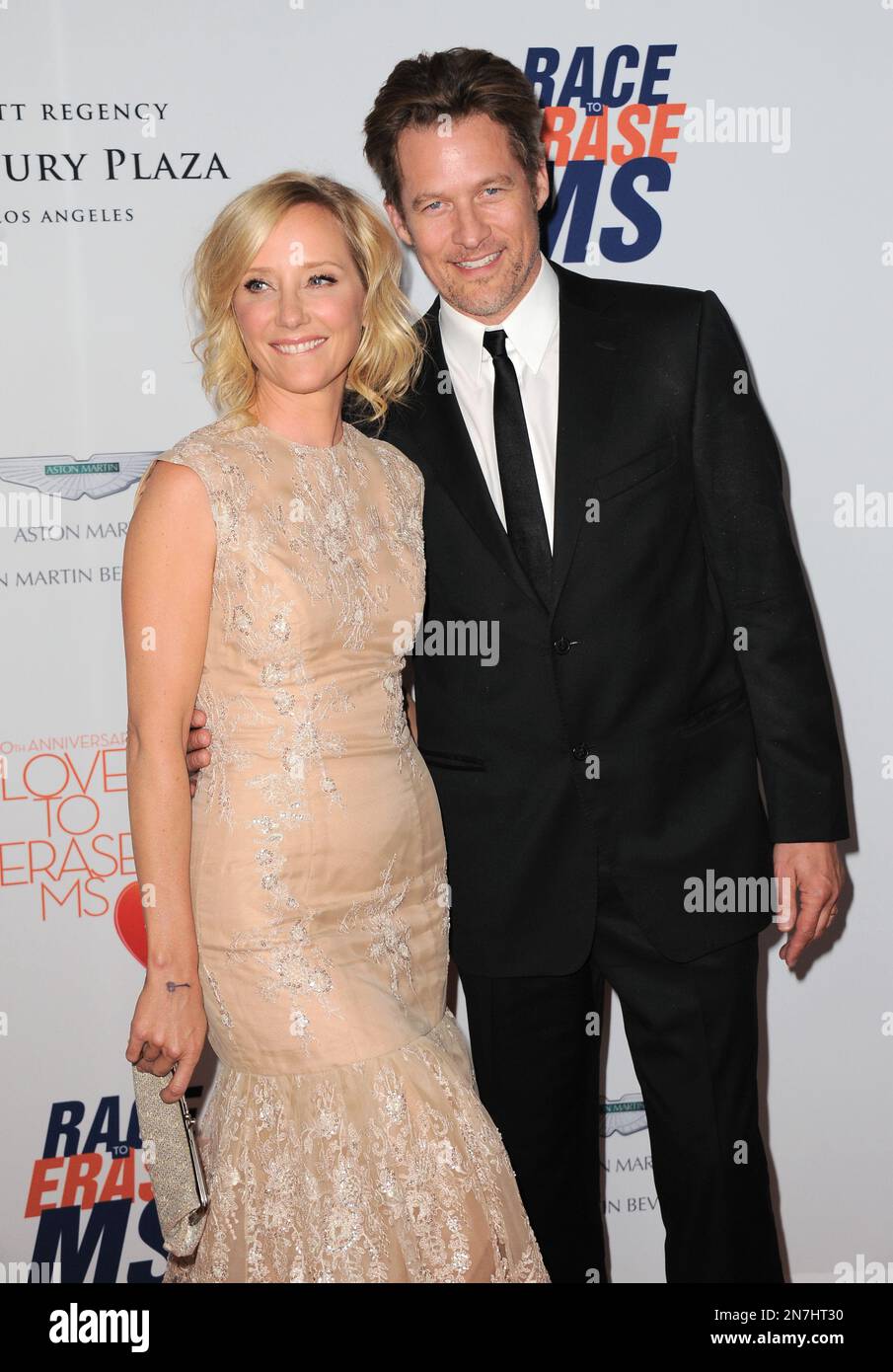 Anne Heche, left, and James Tupper arrive at the 20th annual Race to ...