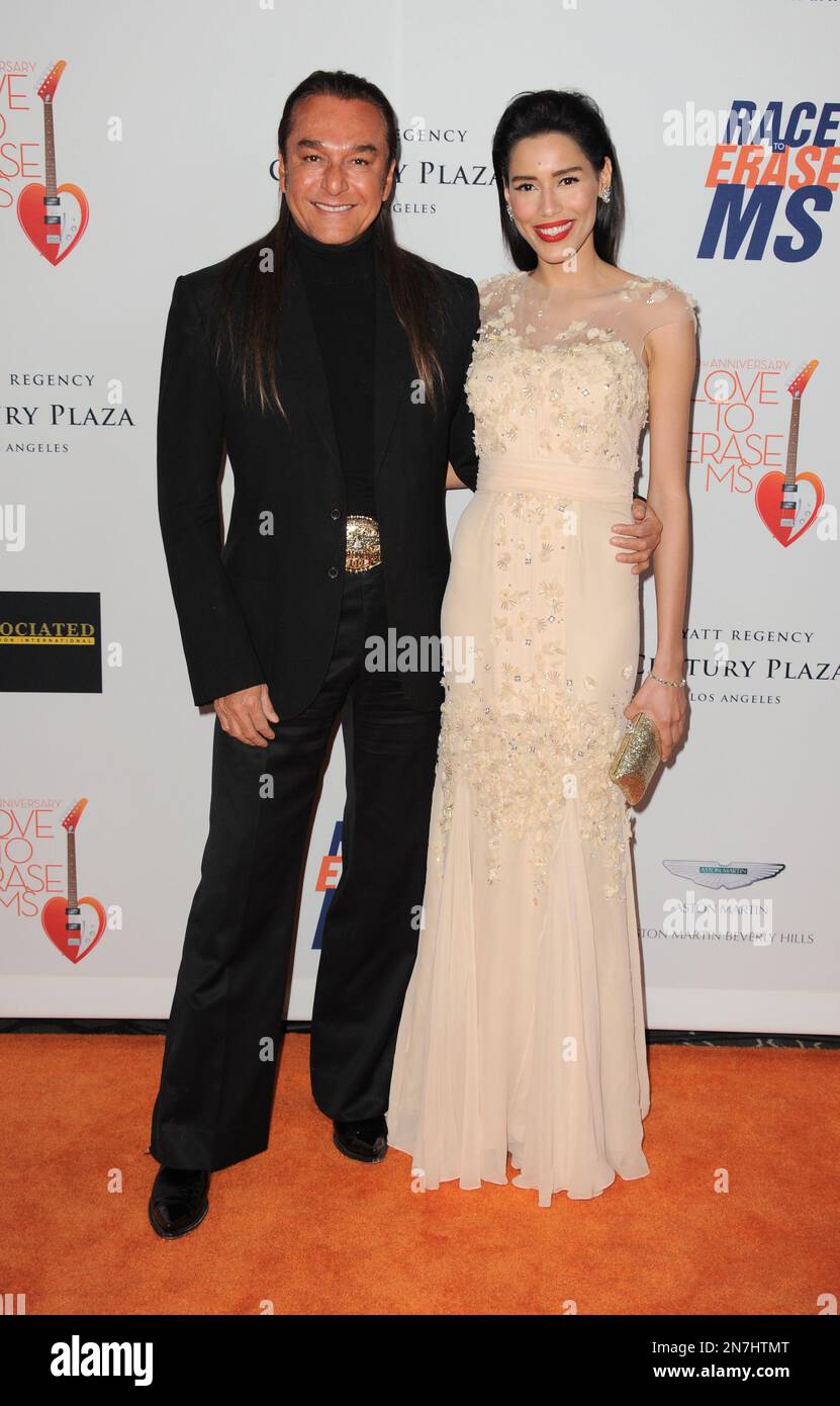 Nick Chavez, left, and Rebecca Da Costa arrive at the 20th annual Race ...