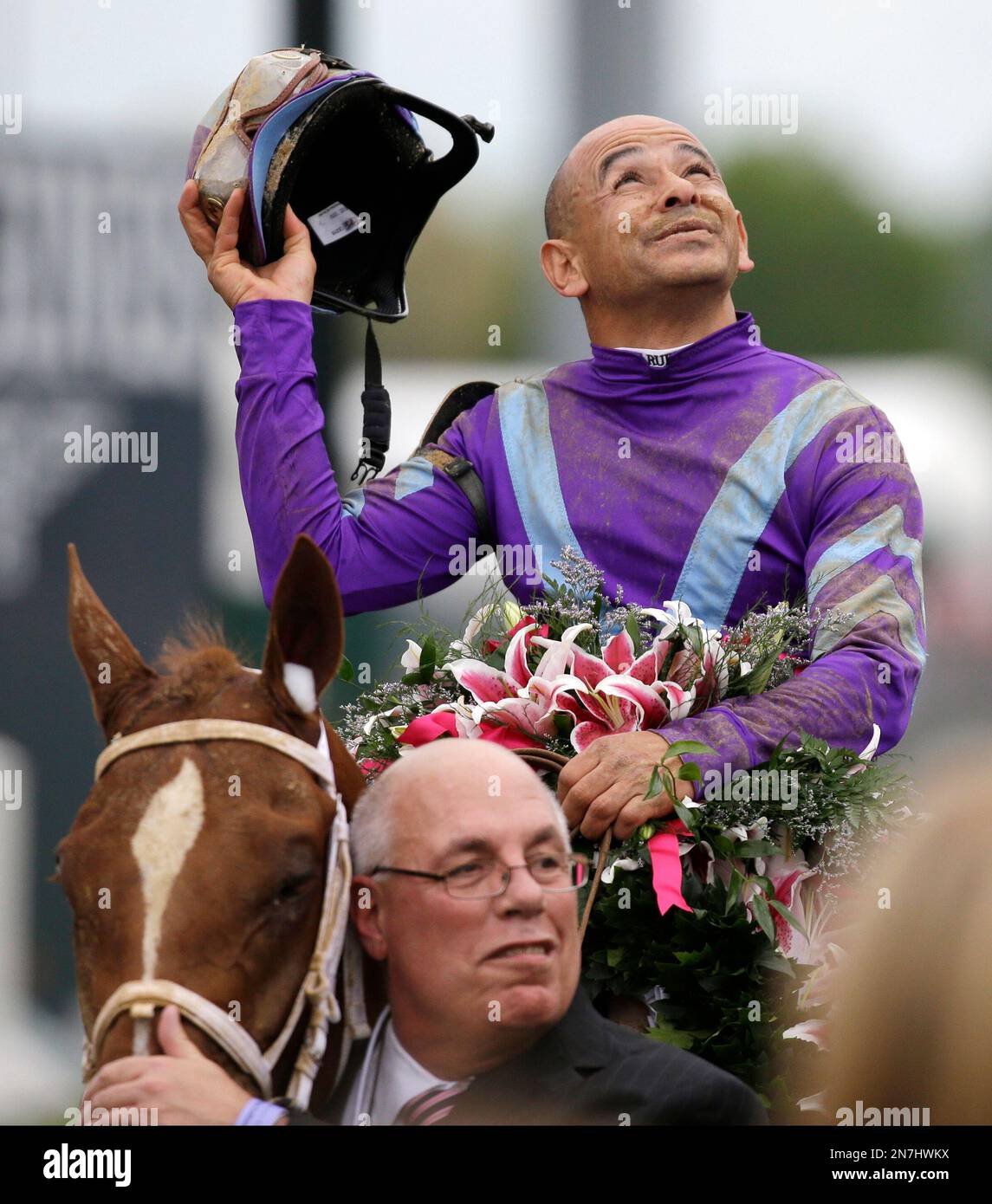Mike Smith and owner Ed Stanco celebrate after Smith rode Princess of Sylmar to a win in the ...