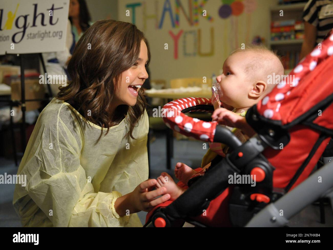 Actress and Starlight Ambassador Bailee Madison, left, interacts with ...