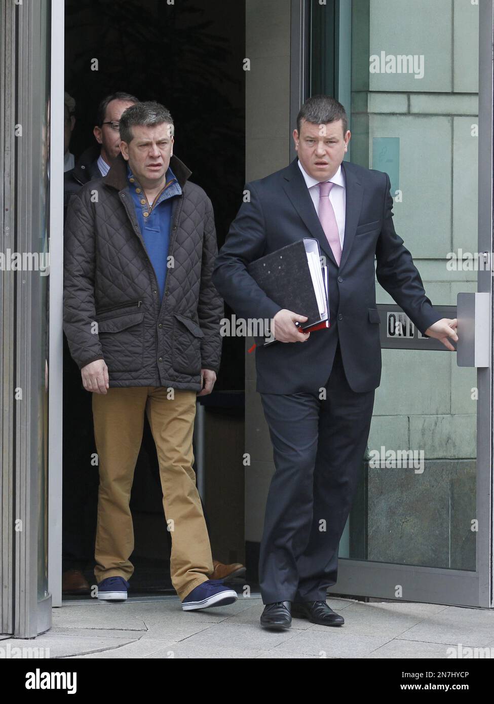 Brian Shivers, left, leaves Belfast Crown Court, with his solicitor ...