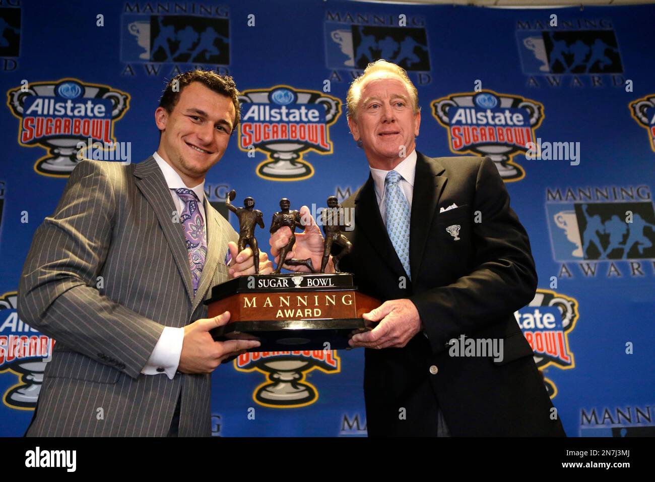 Heisman Trophy winner and Texas A&M quarterback Johnny Manziel, left ...