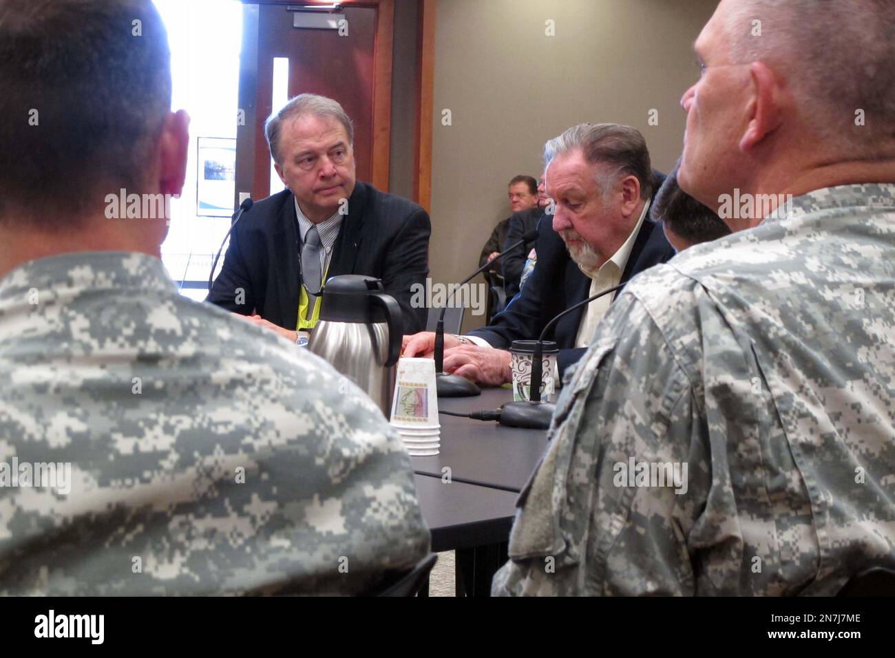 Fargo, N.D., Deputy Mayor Tim Mahoney, dressed in suit and tie, and ...