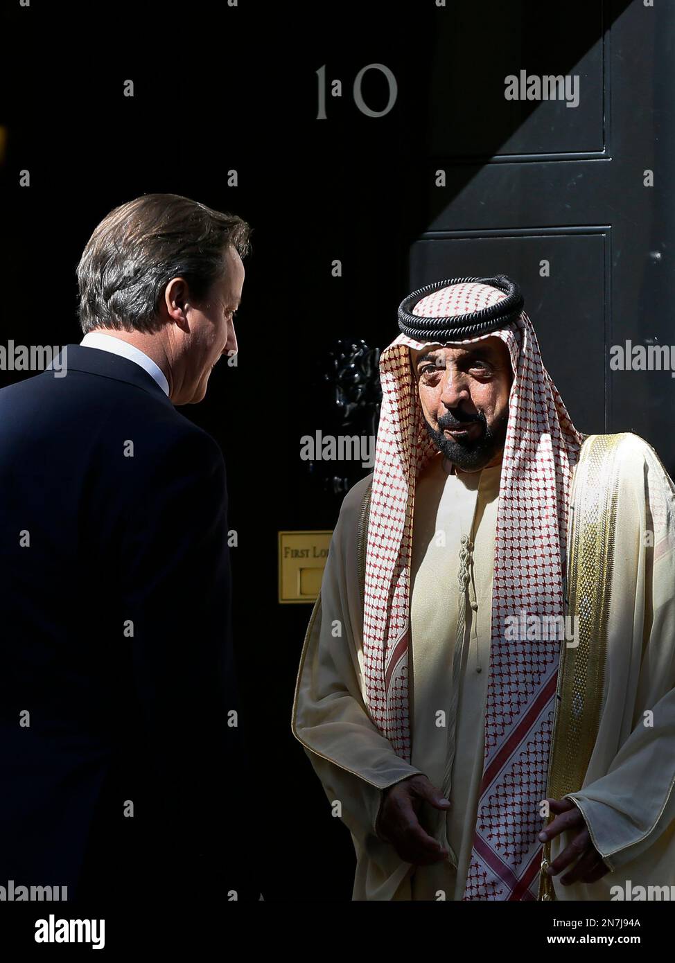 Britain's Prime Minister David Cameron, left, greets President of the ...
