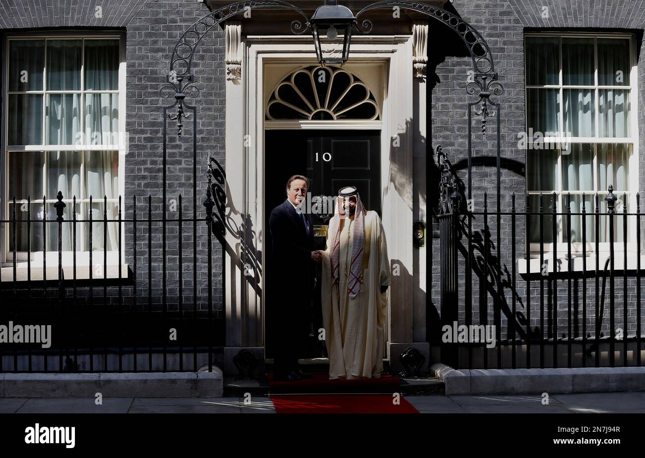 Britain's Prime Minister David Cameron, left, greets President of the ...