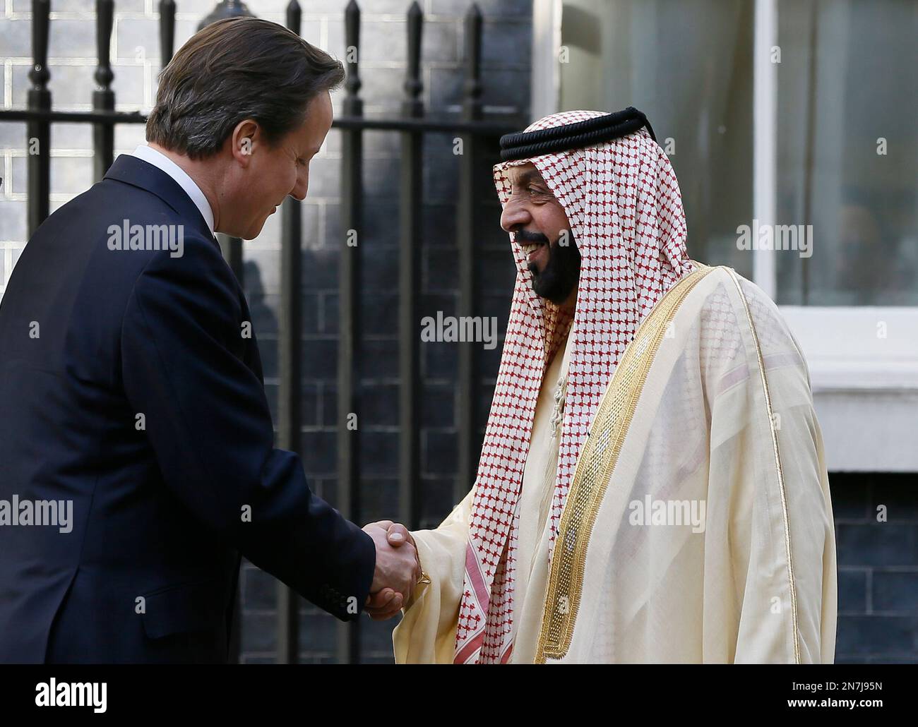 Britain's Prime Minister David Cameron, left, greets President of the ...