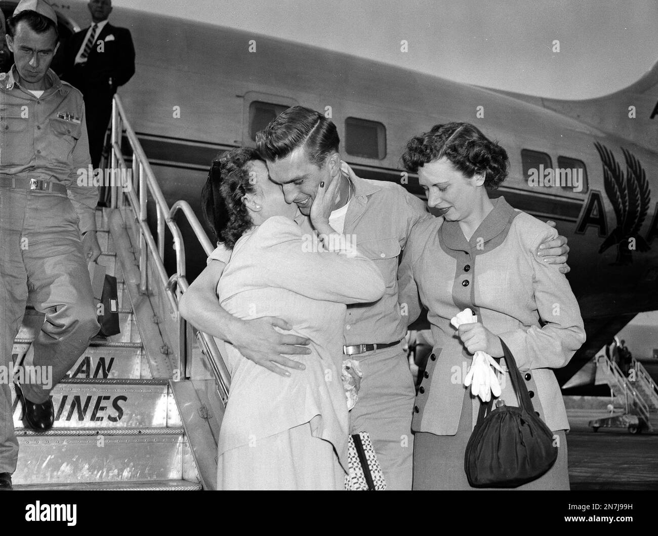 Robert W. Toth and his mother, Nettie Mertz of Pittsburgh, embrace at ...