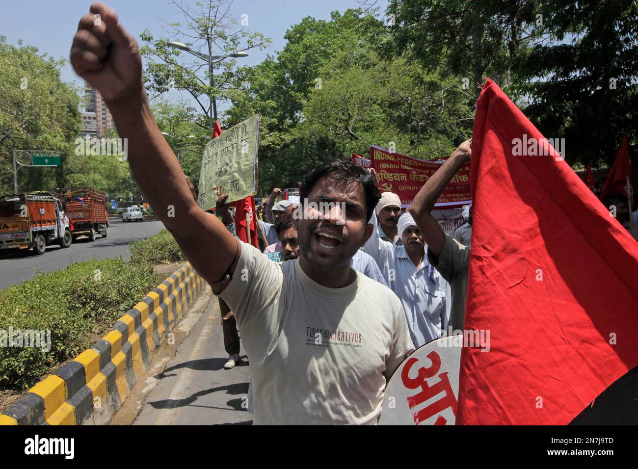 Members of Indian Federation of Trade Unions shout slogans as they ...