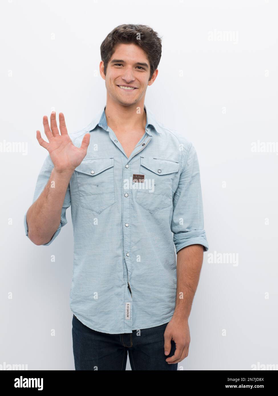 Tyler Posey poses for a photo at the 2013 MTV Movie Awards at Sony ...