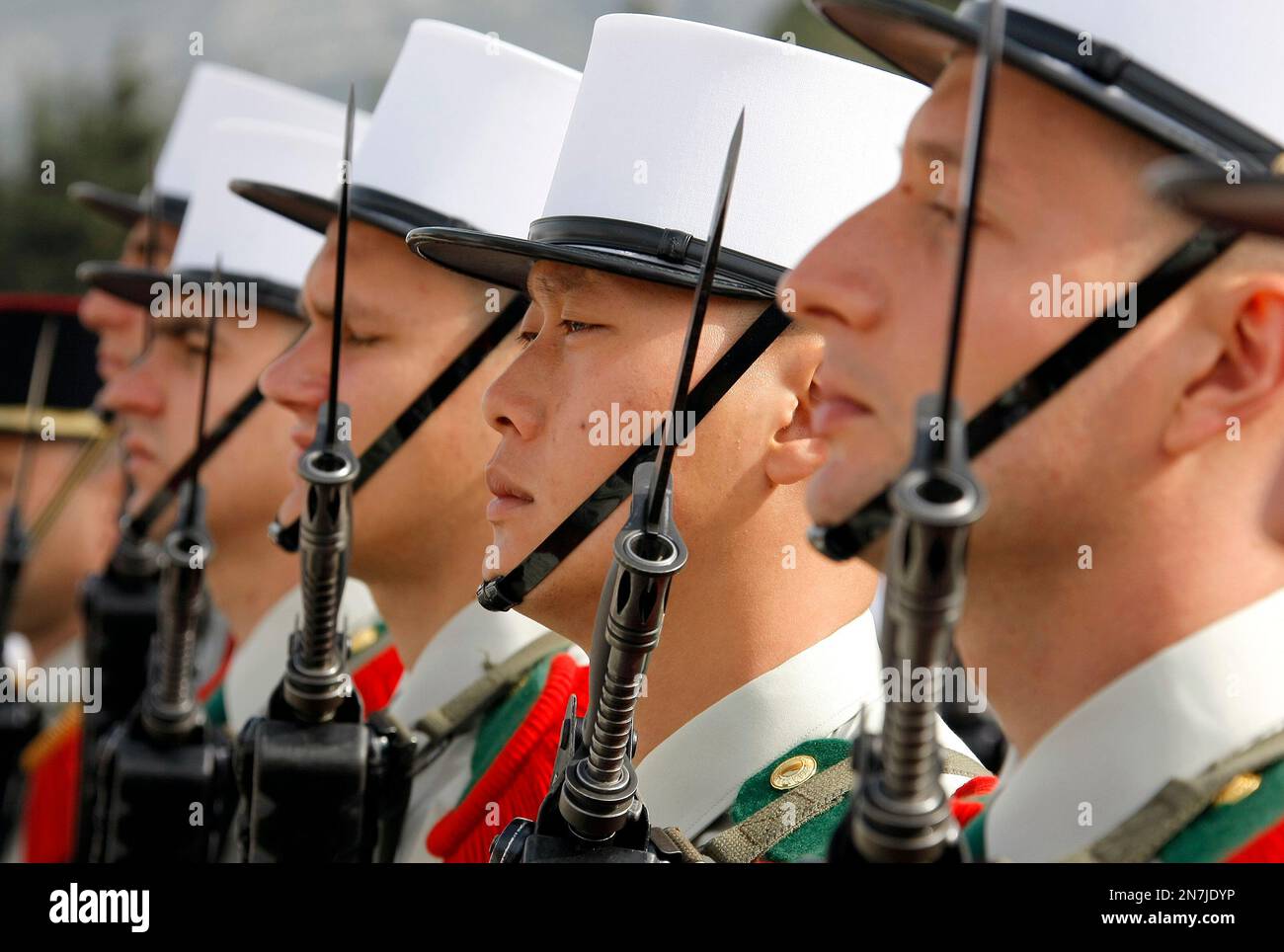 Legionnaires of the 4th Regiment of the French Foreign Legion hold ...