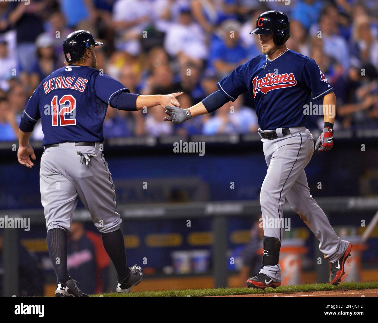 Cleveland Indians' Ryan Raburn is congratulated by teammate Mark ...