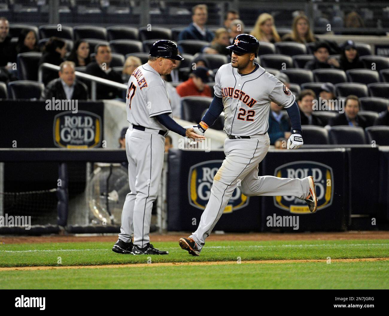 Houston Astros batter Carlos Corporan, right, celebrates with third ...