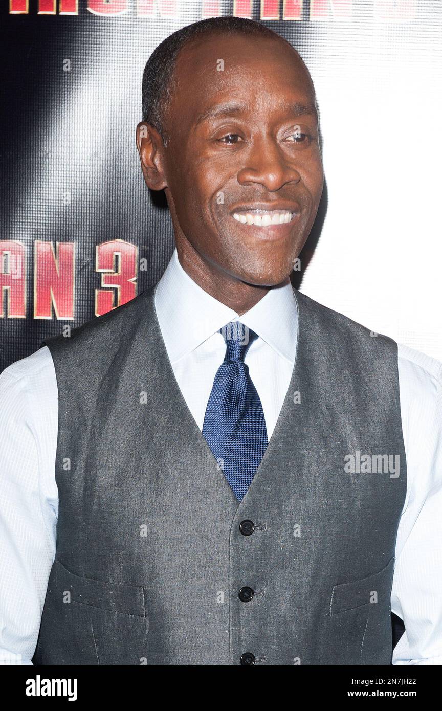 Actor Don Cheadle arrives at the advance screening of "Iron Man 3" on ...