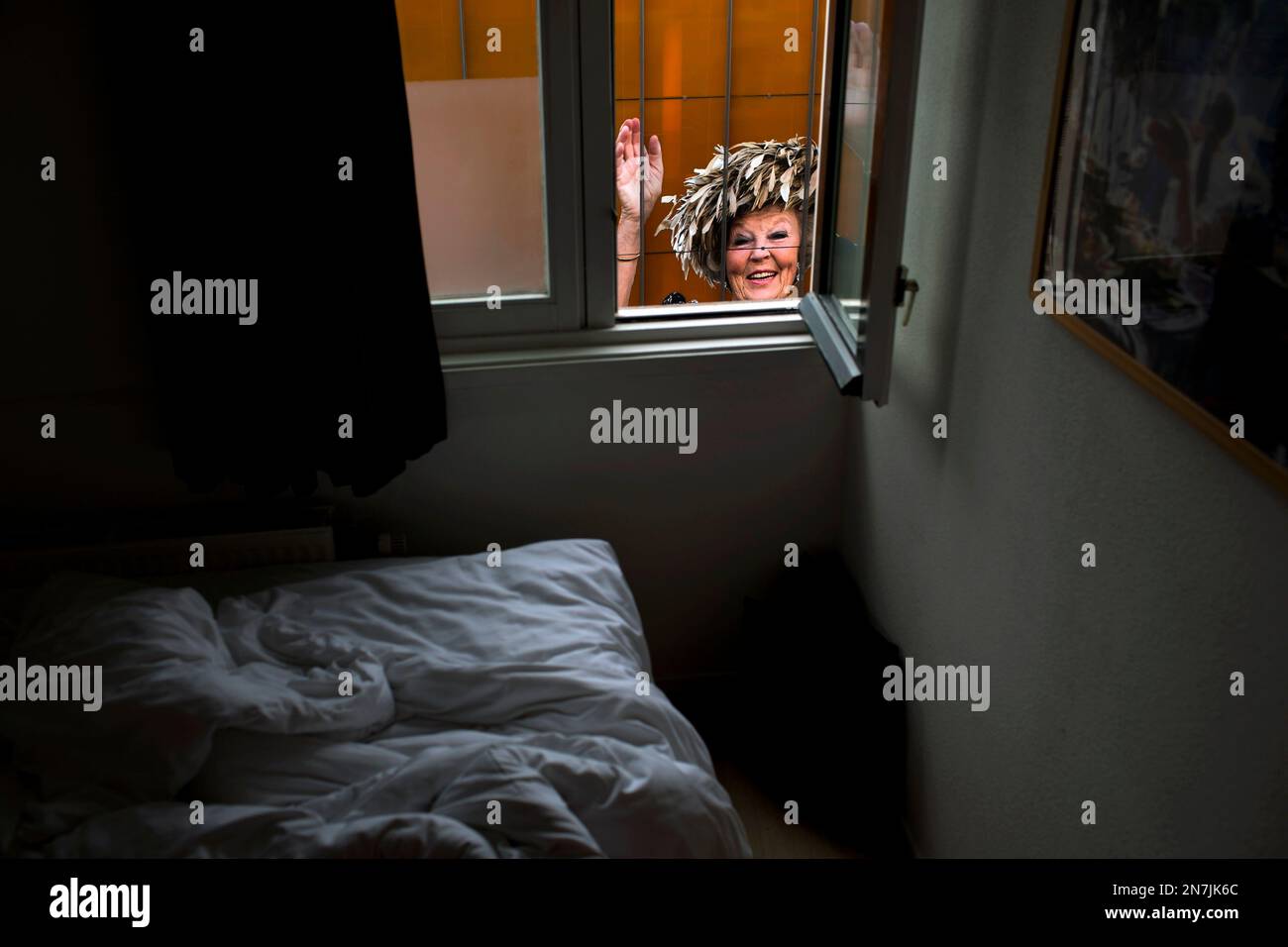 An image of Dutch Queen Beatrix Is photographed from the window of an ...