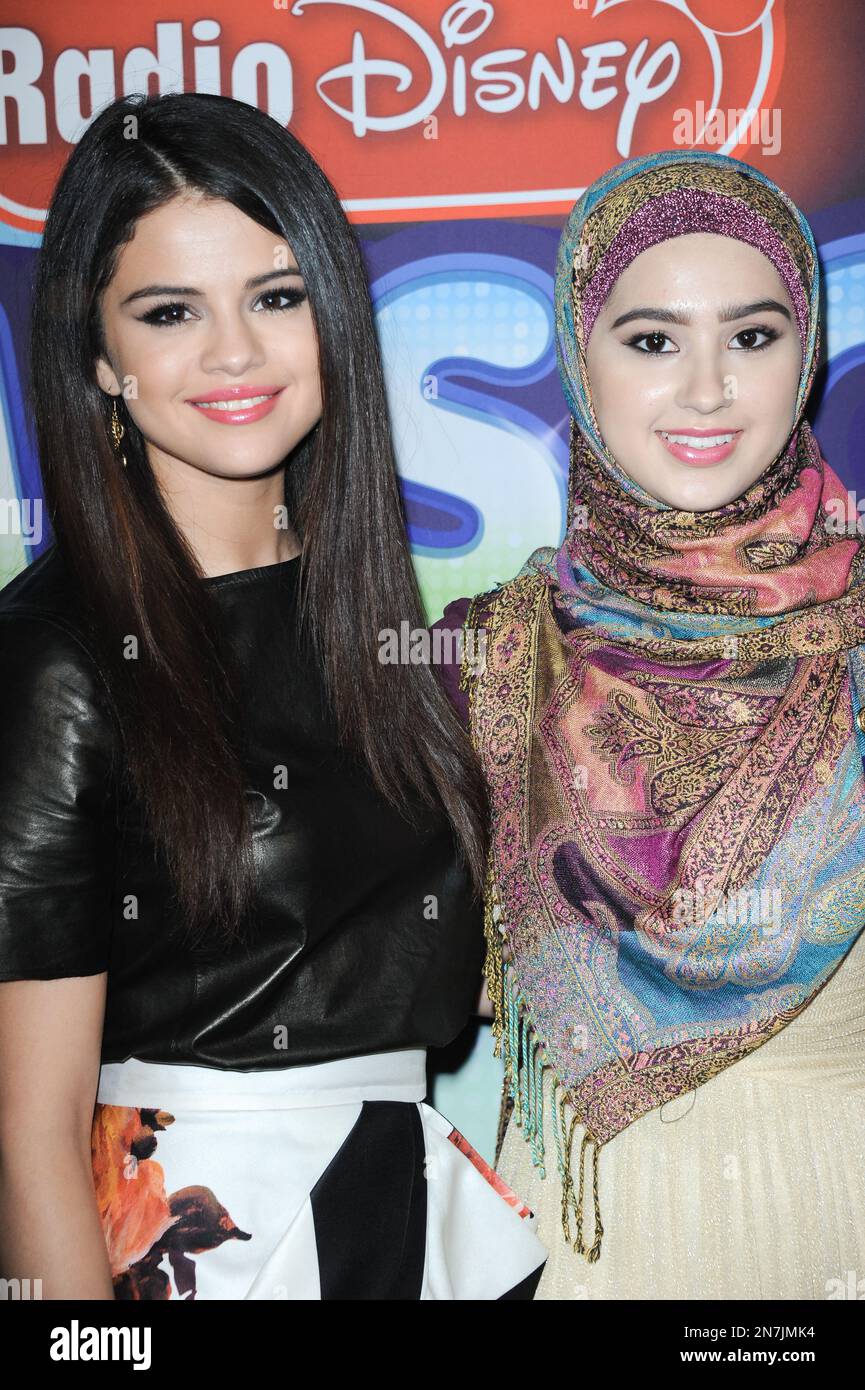 Selena Gomez, left, and Misha Ahmad attend the Radio Disney Music ...