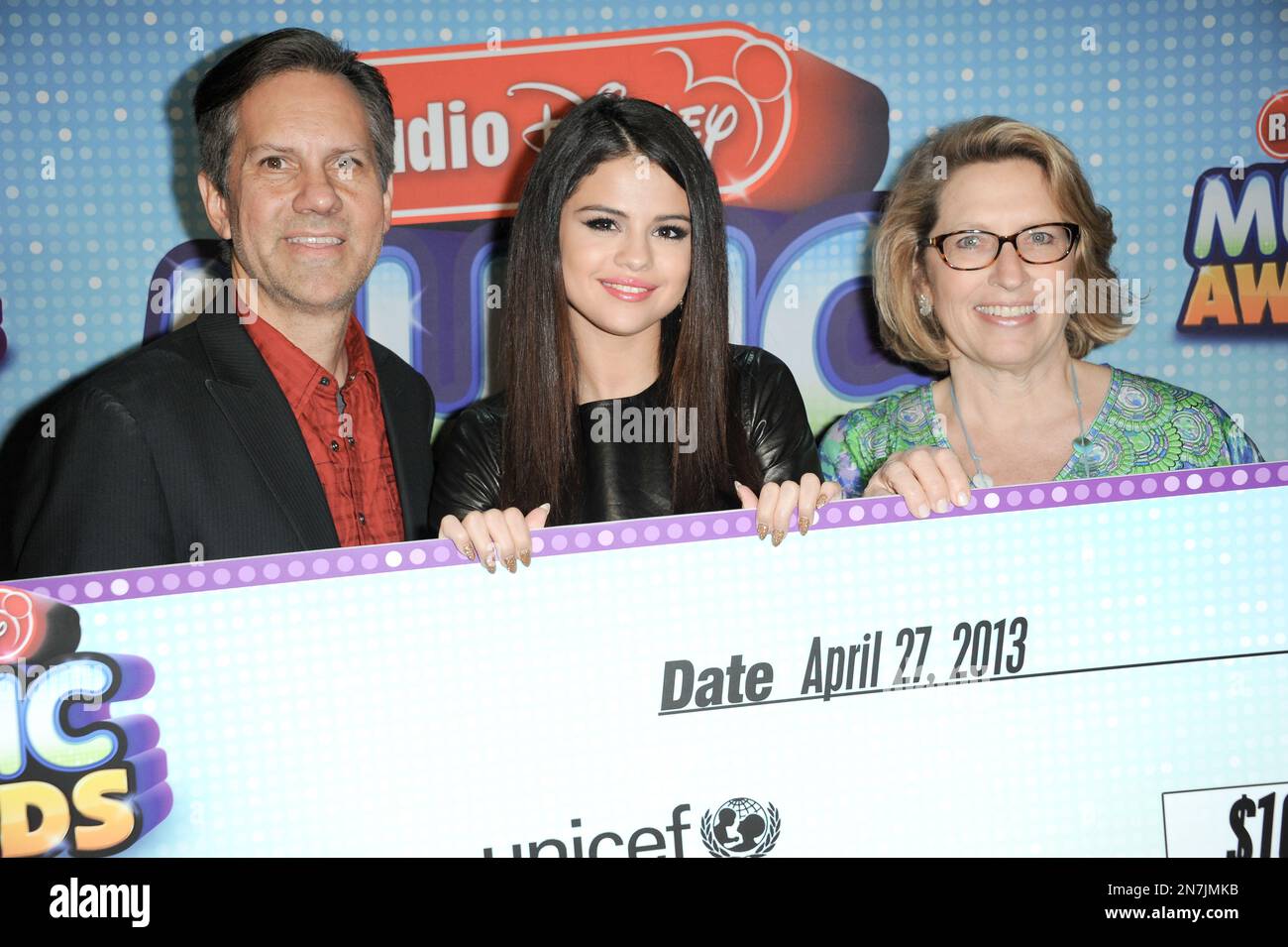 From left, Phil Guerini, Selena Gomez, and Leslie Goodman attend the ...