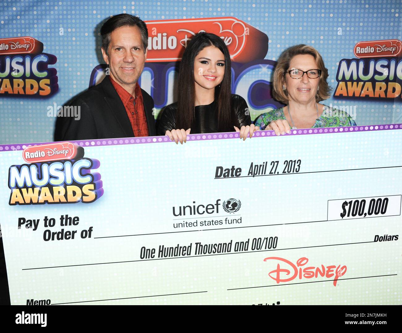 From left, Phil Guerini, Selena Gomez, and Leslie Goodman attend the ...