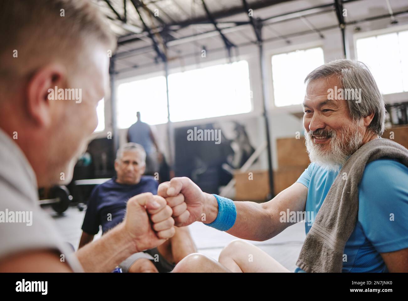 Fitness Gym And Men With Fist Bump For Senior Support Personal