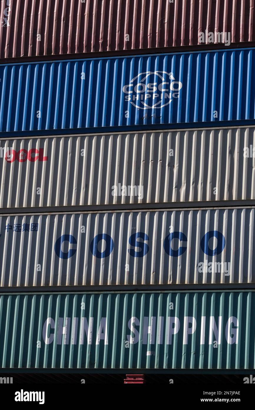 Shipping containers are stacked at the Long Beach Container Terminal ...