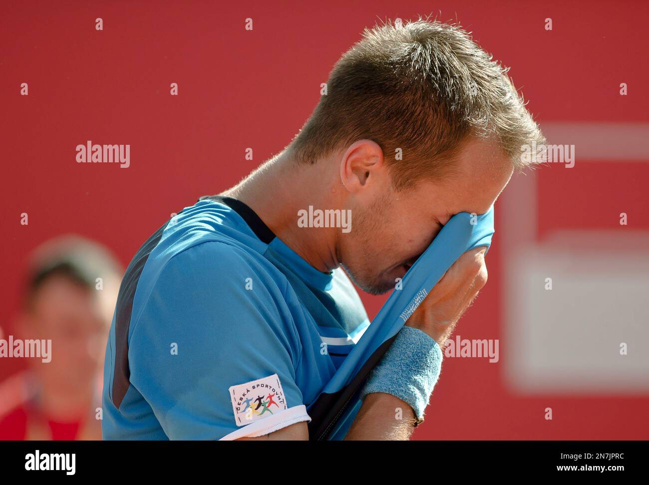 Lukas Rosol of the Czech Republic reacts after the final point and ...