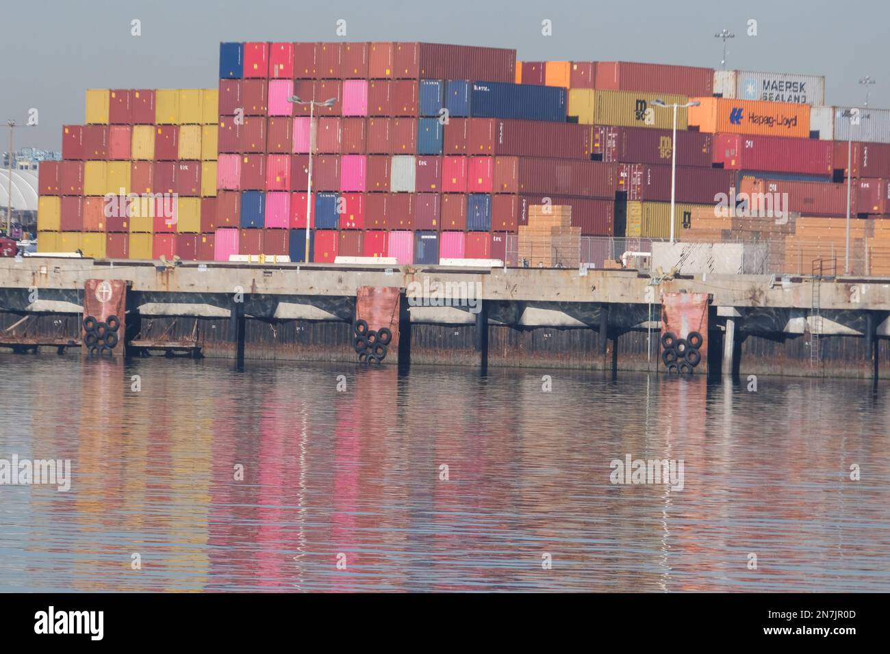 Shipping containers are stacked at the Port of Long Beach in Los ...